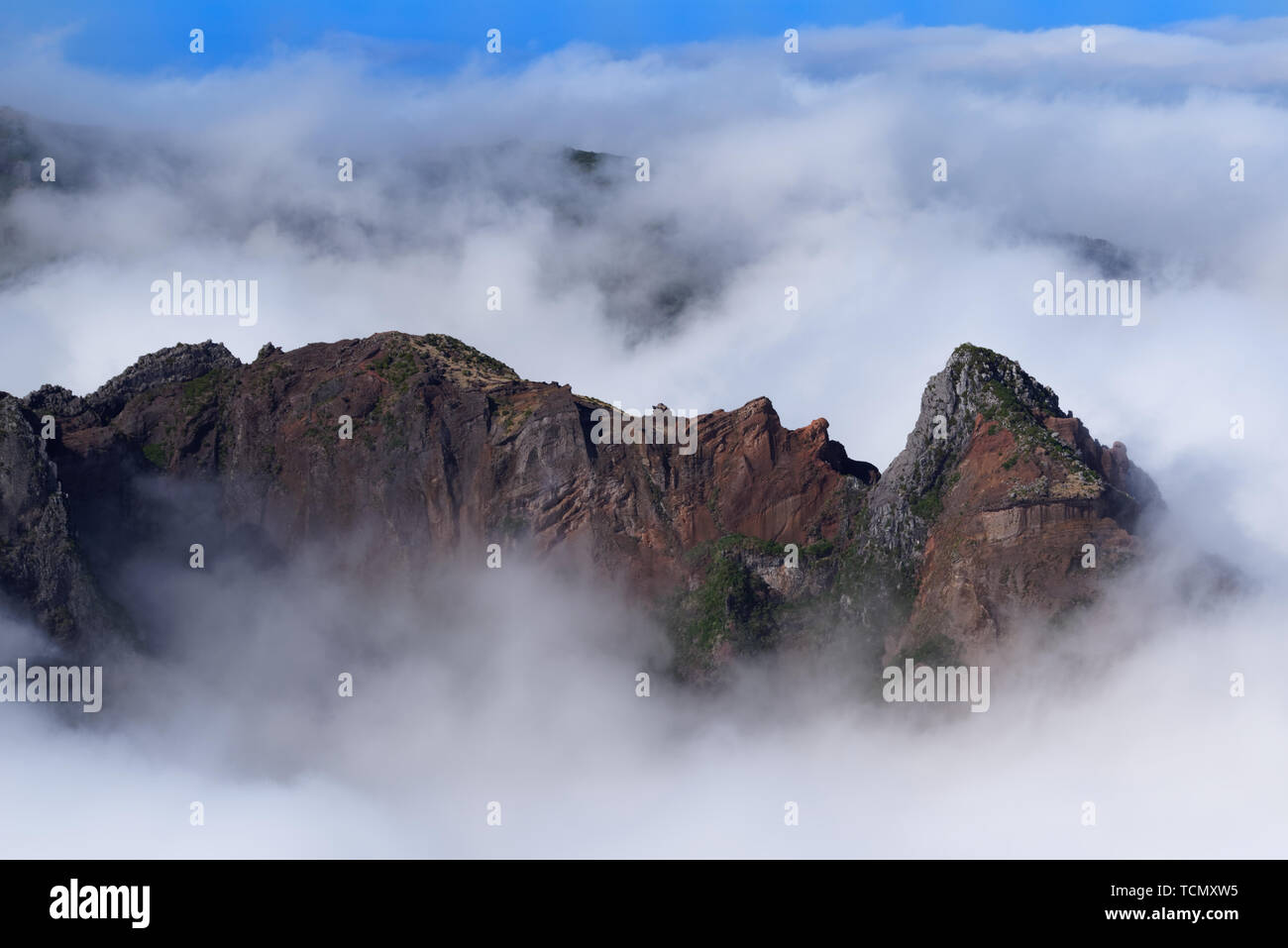 Rock formation in dense clouds on Pico do Arieiro on Portuguese island ...