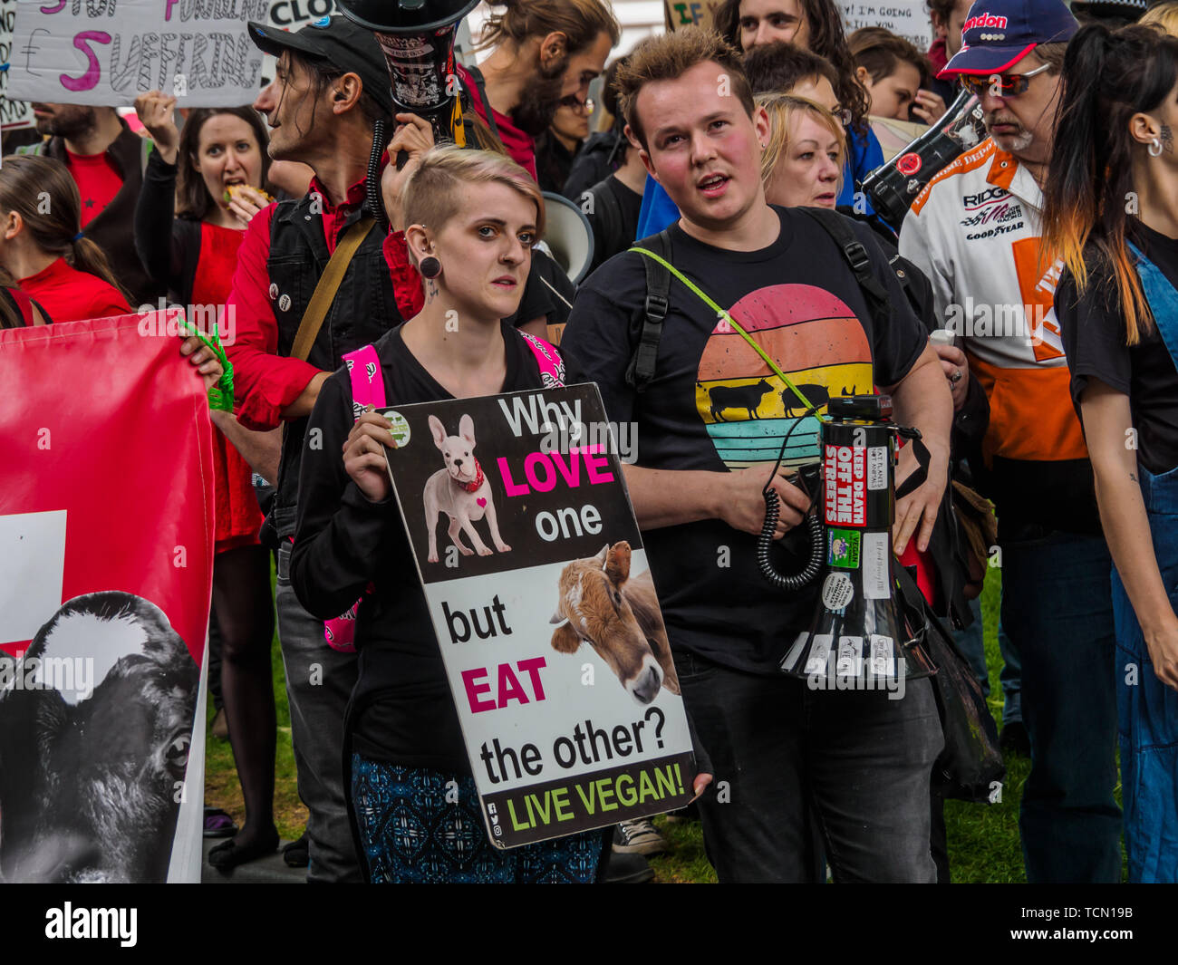 Young people handing out leaflets hi-res stock photography and images ...