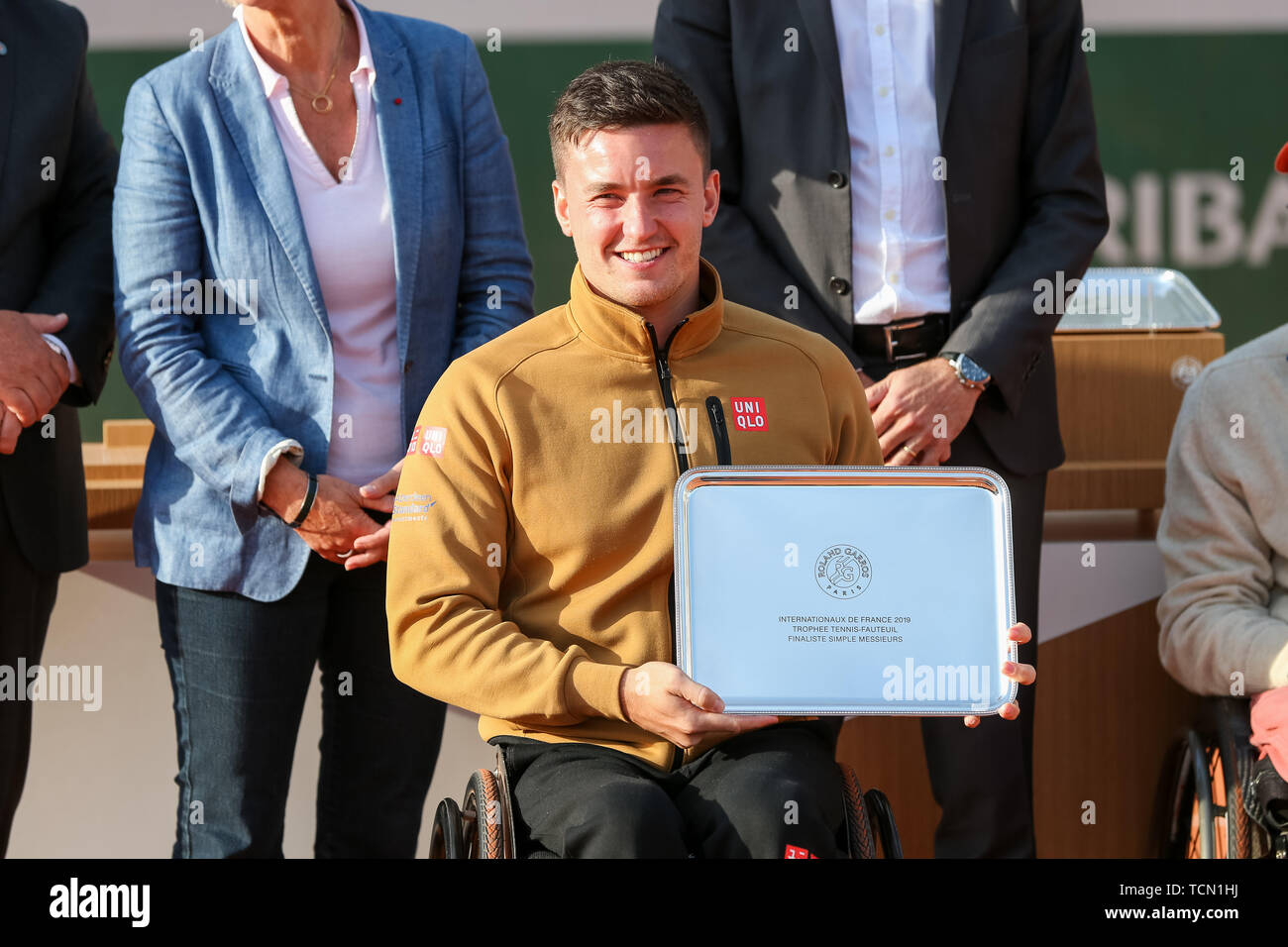 Gordon Reid of Great Britain poses with the trophy during the trophy ...
