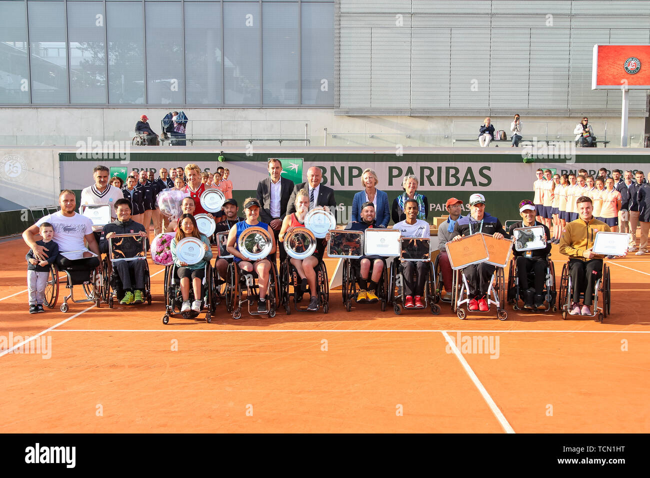 All the winners and runner-ups pose with their trophies during the ...