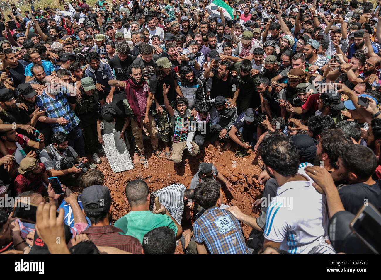 Ad Dana, Syria. 09th June, 2019. People bury the body of Abdel-Baset al ...