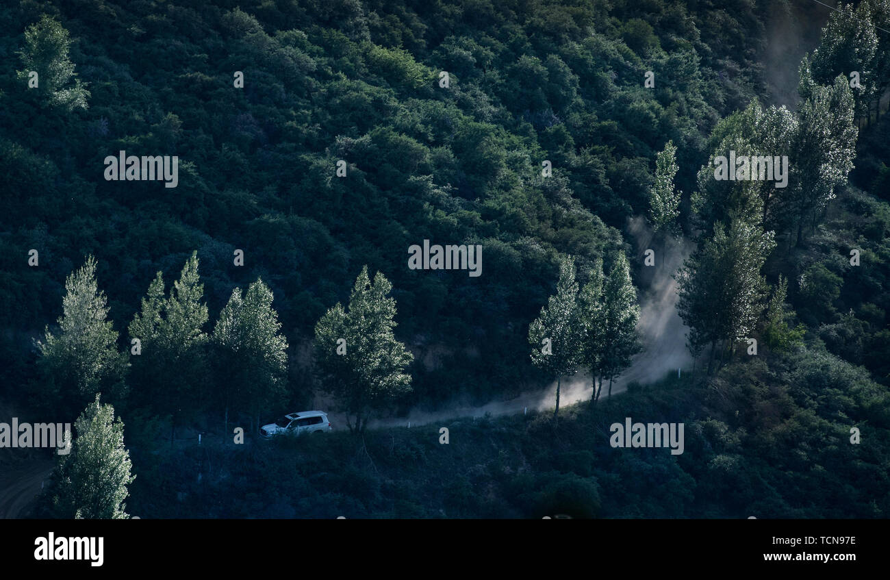 Yan'an, China's Shaanxi Province. 5th June, 2019. A car drives on the ...
