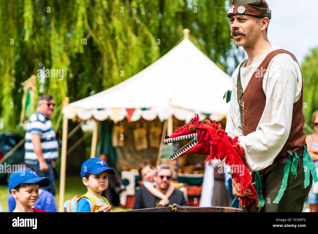 Re-enactment event. Medieval theatre, outdoors, man, mummer or player ...