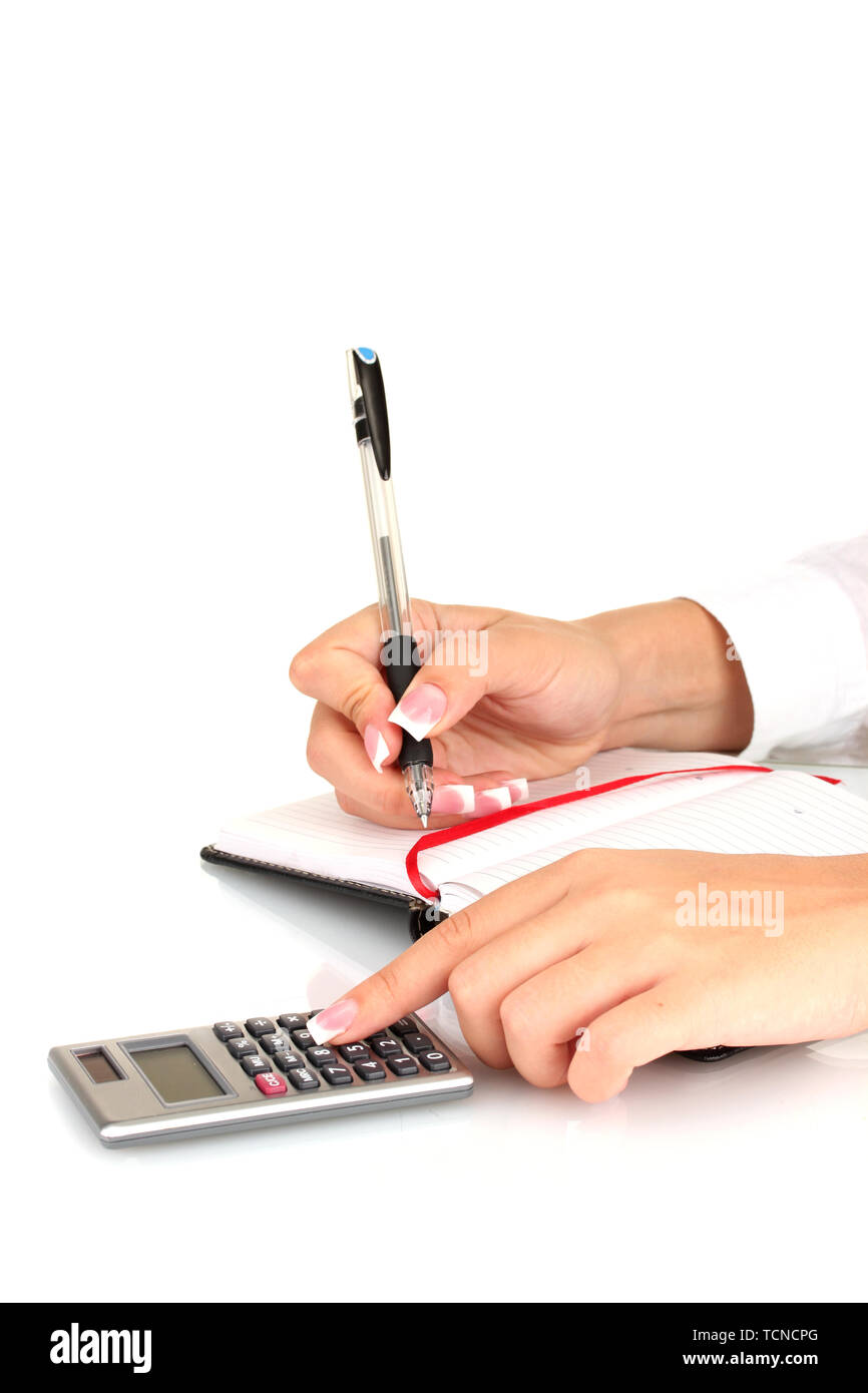 Hands working on calculator Cut Out Stock Images & Pictures - Alamy