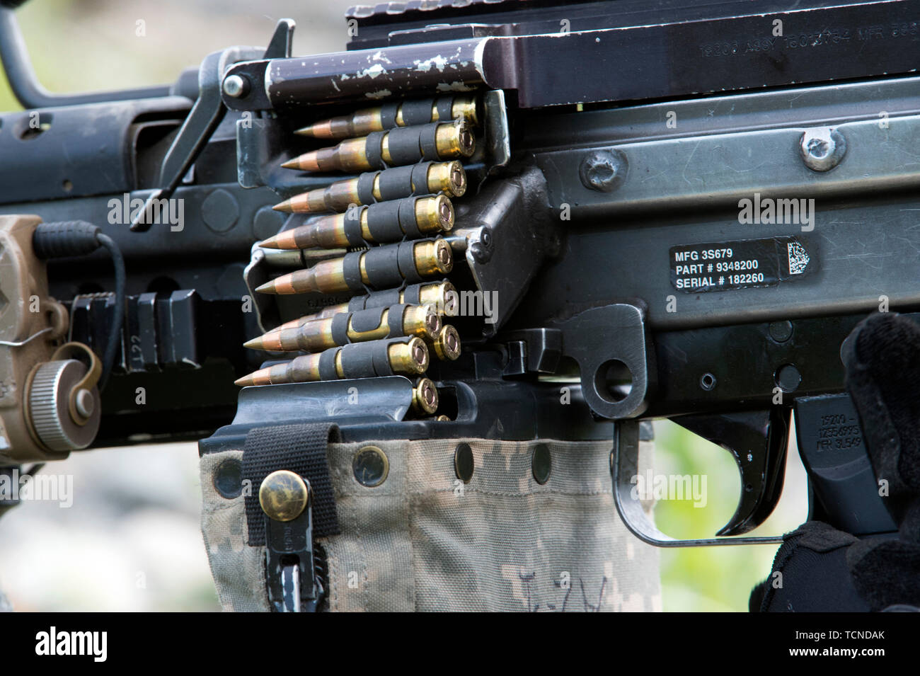A M249 light machine gun is loaded and ready for live fire training ...