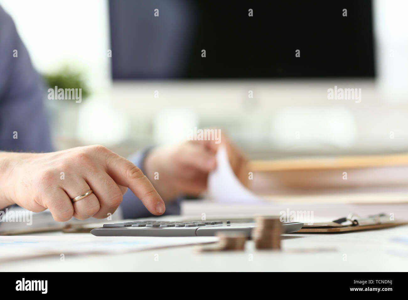 Check calculation hand hi-res stock photography and images - Alamy
