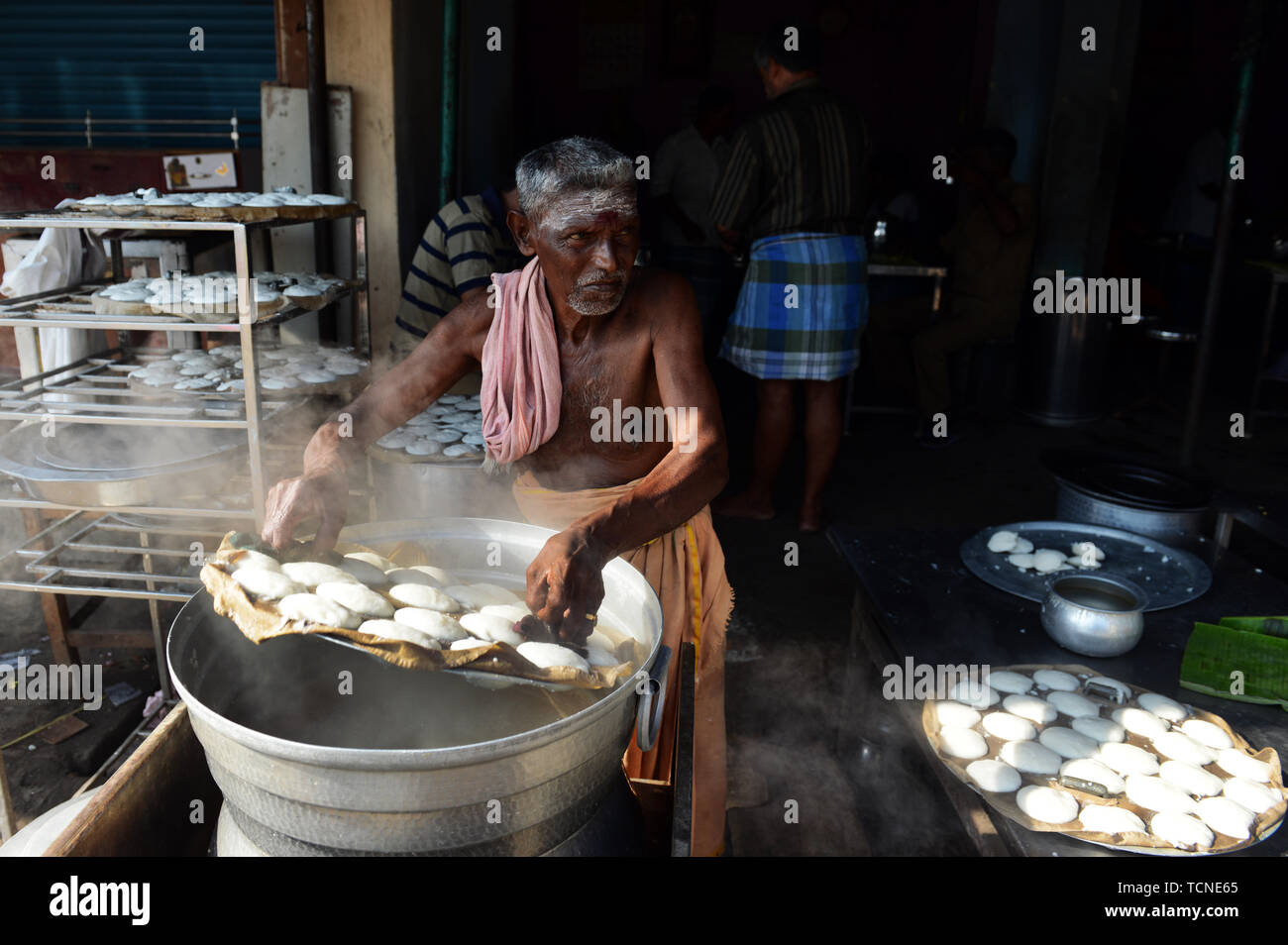 Idly ( savoury rice cake ) preparation Stock Photo - Alamy