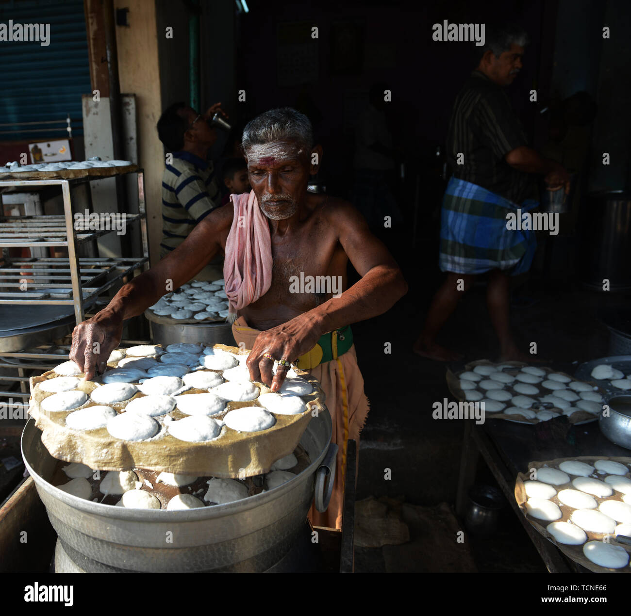 Idly ( savoury rice cake ) preparation Stock Photo - Alamy