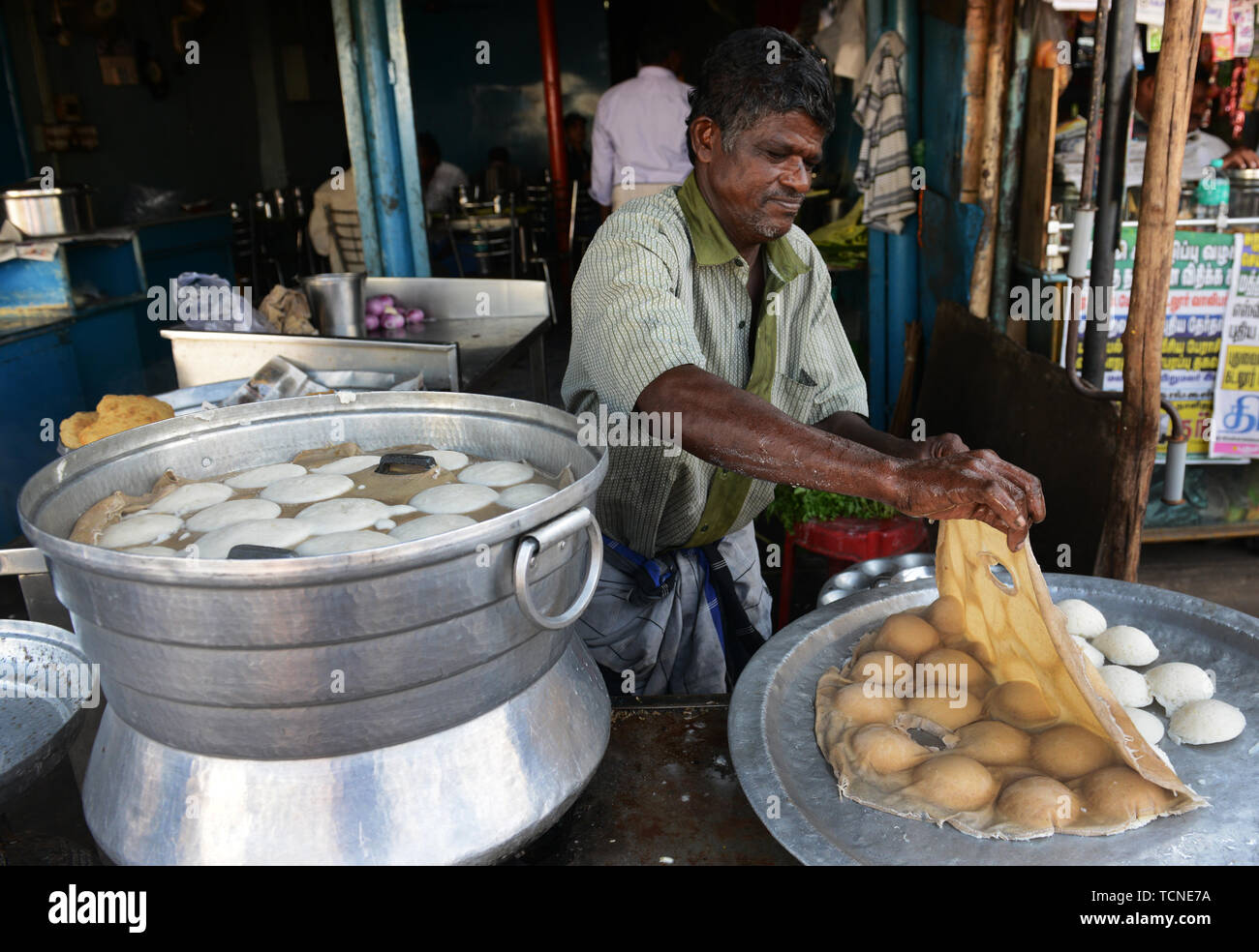 Idly ( savoury rice cake ) preparation Stock Photo - Alamy