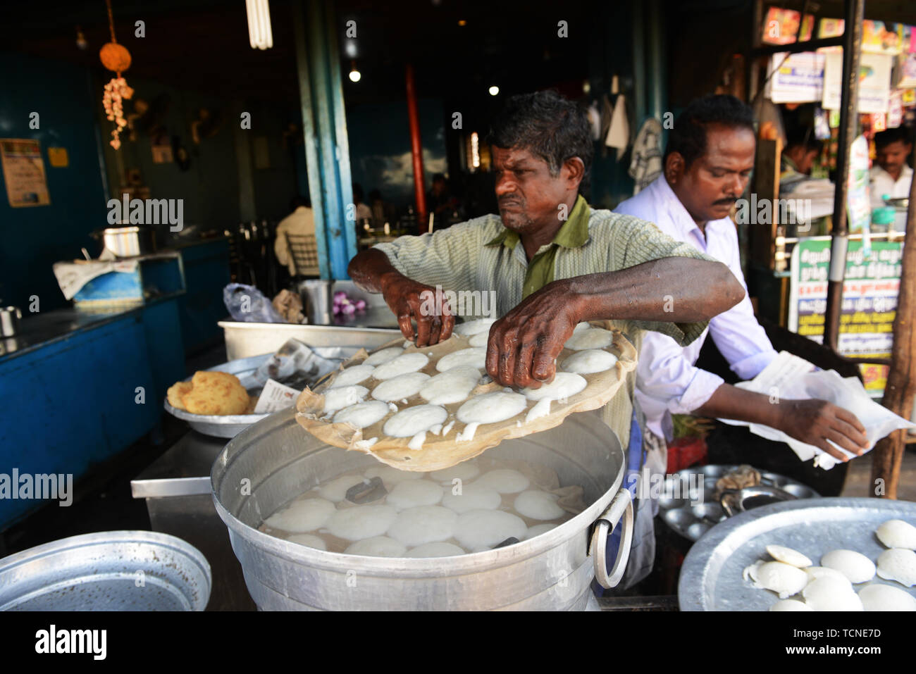 Idly ( savoury rice cake ) preparation Stock Photo - Alamy