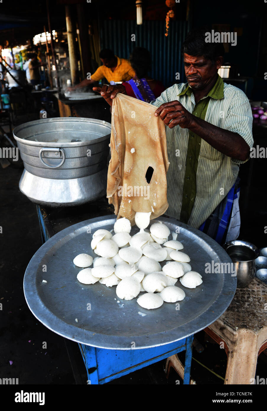 Idly ( savoury rice cake ) preparation Stock Photo - Alamy
