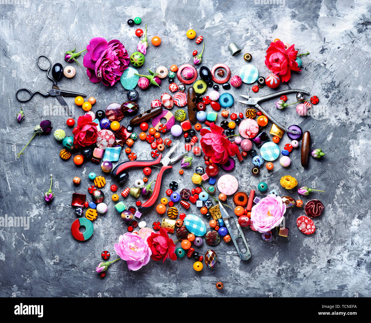 Set of multi-colored beads for needlework.Beads and tools.Handicraft ...