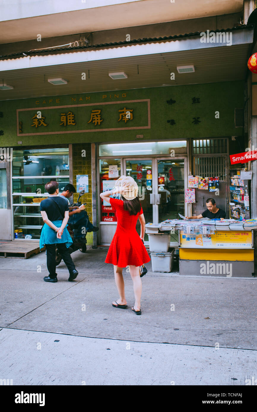 Red dress tour the big three buses Stock Photo - Alamy
