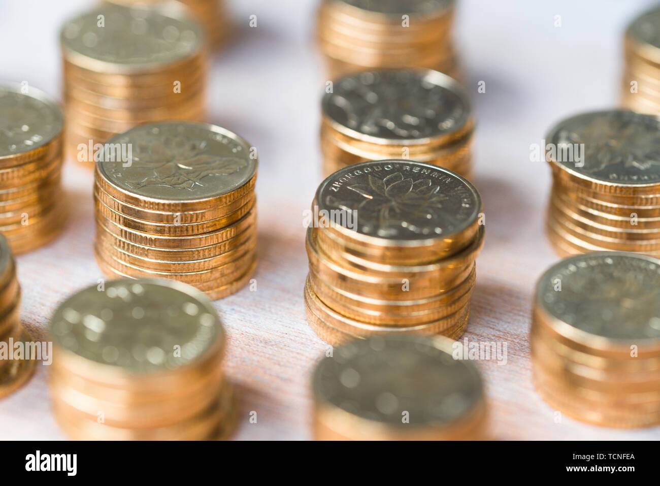 Stacked gold coins Stock Photo - Alamy