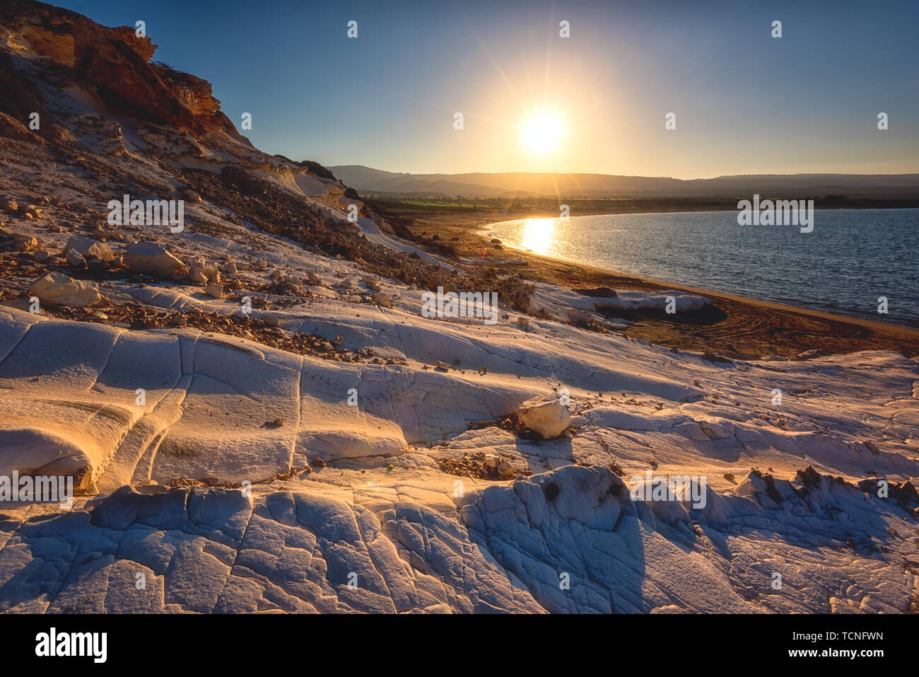 Chalk beach on Cyprus at sunrise, scenic seascape with white rocks ...