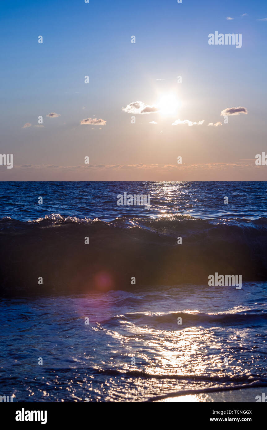 Amazing sea sunset, the sun, waves, clouds Stock Photo - Alamy
