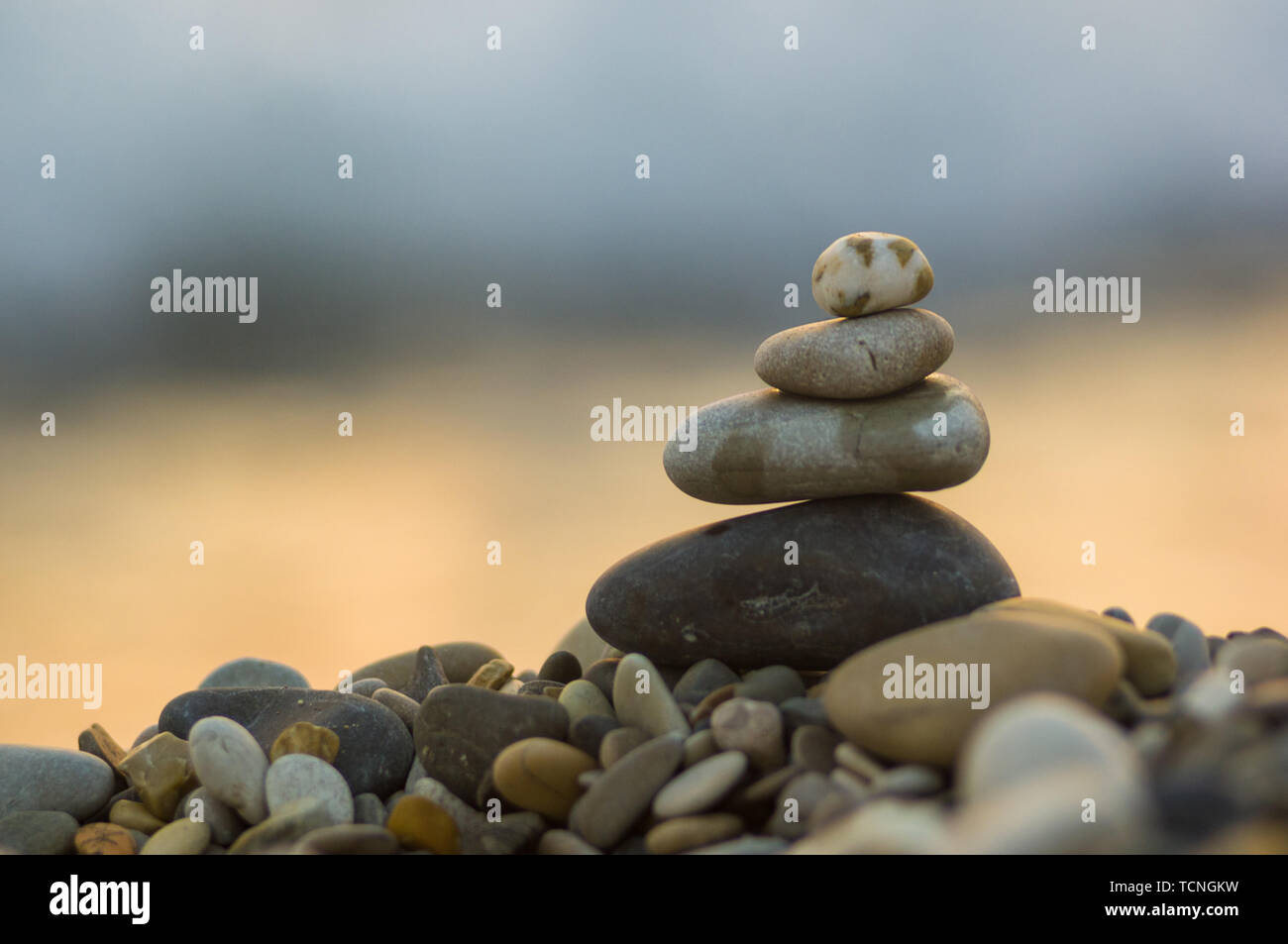 stack of zen stones on pebble beach Stock Photo - Alamy