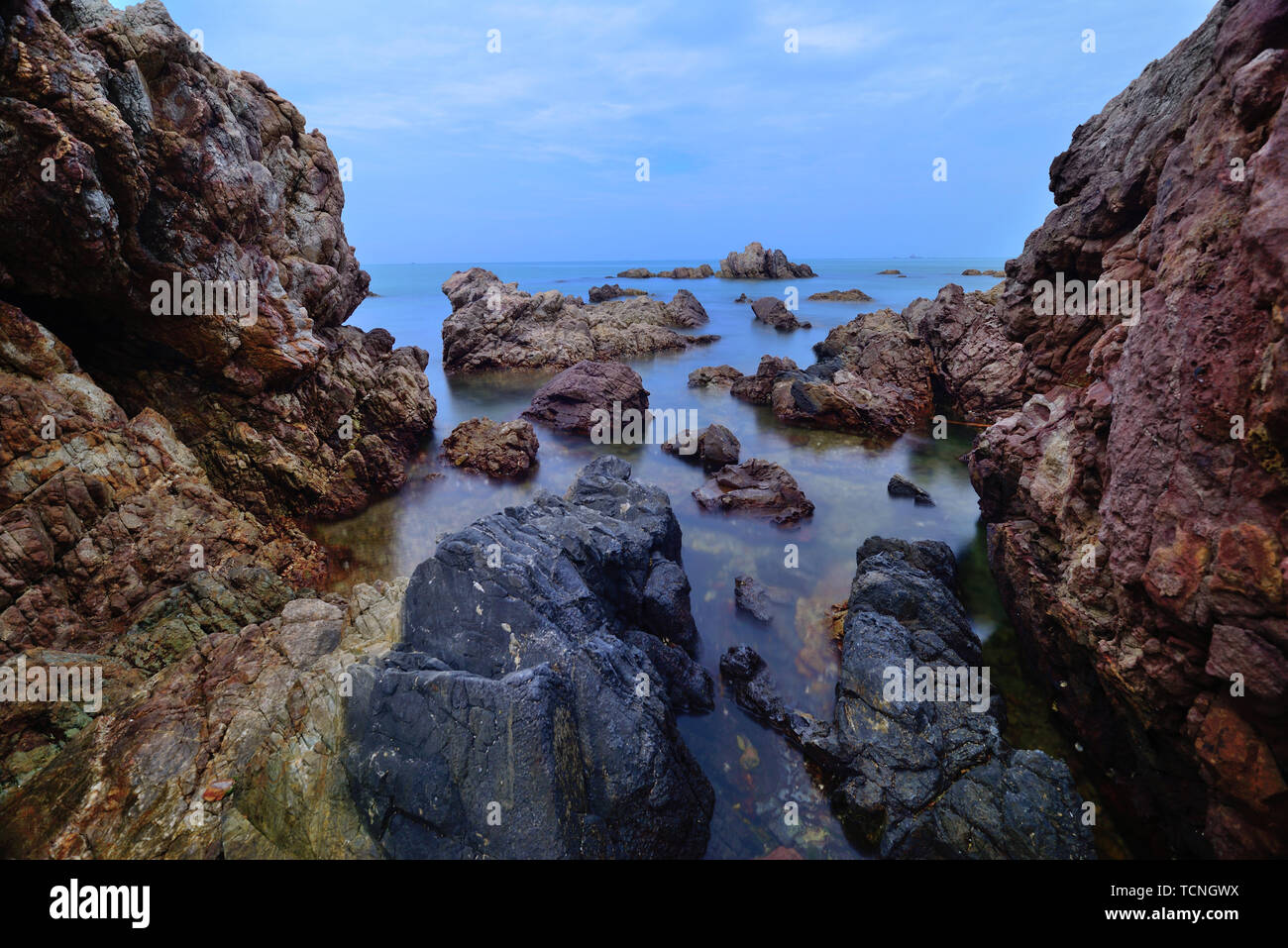Slow shutter sea view rock natural scenery Stock Photo - Alamy