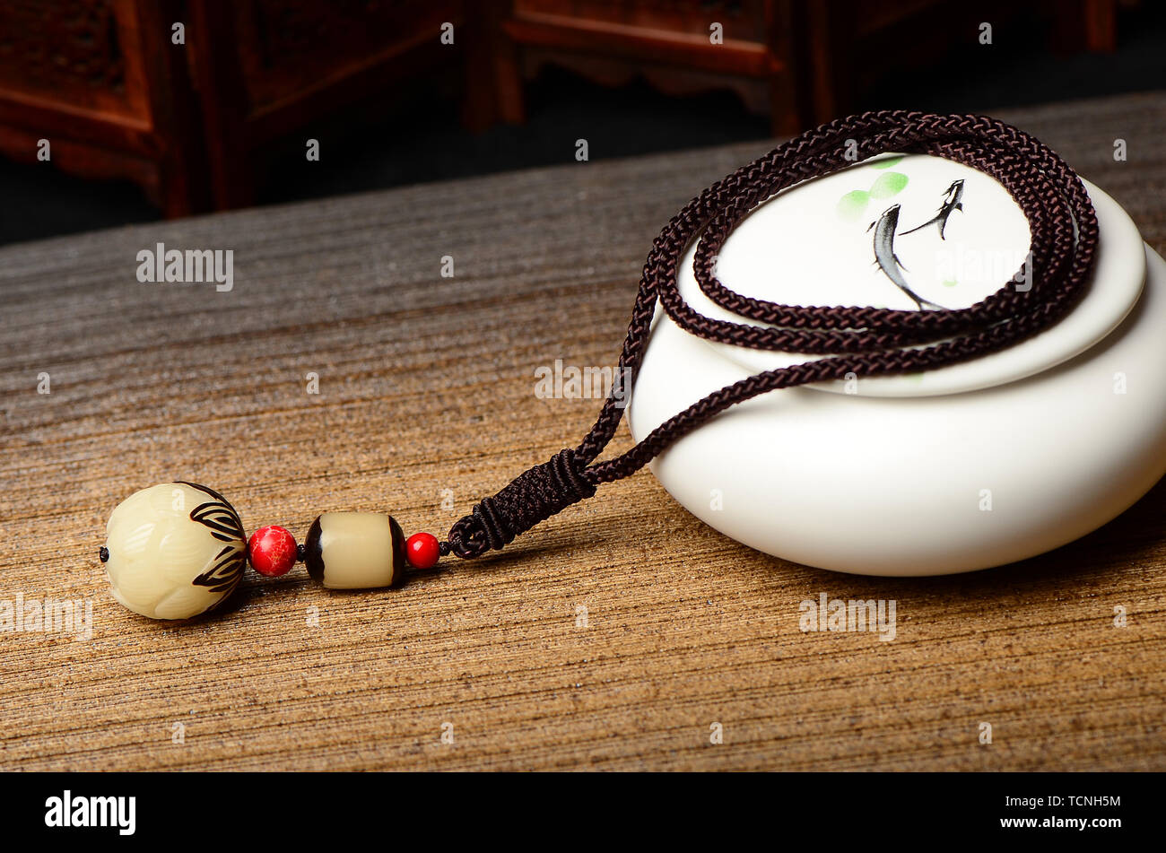 Bodhi pendant, necklace, wool chain Stock Photo - Alamy