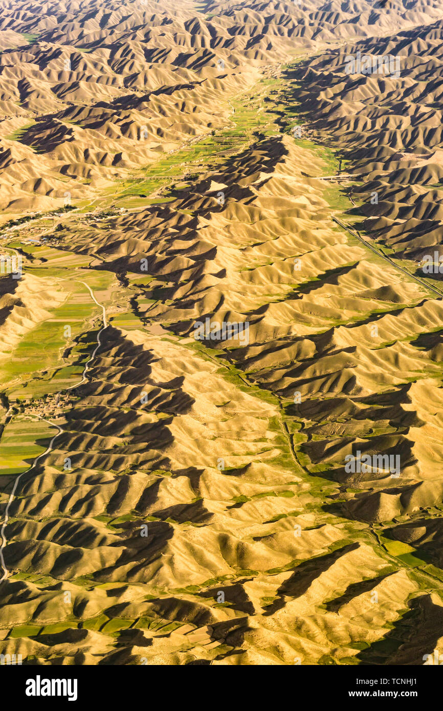 Aerial shooting plateau mountains, mountains, snow mountains Stock ...