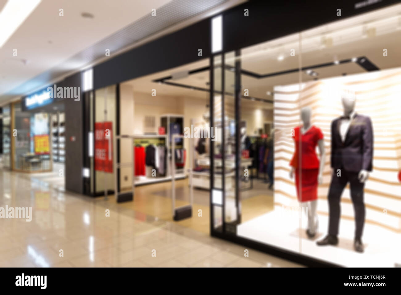 The interior of modern fashion shop Stock Photo - Alamy