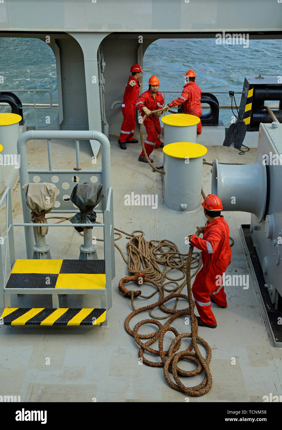 santos port, brazil - 2014.01.20: philippine seamen on aft station of ...