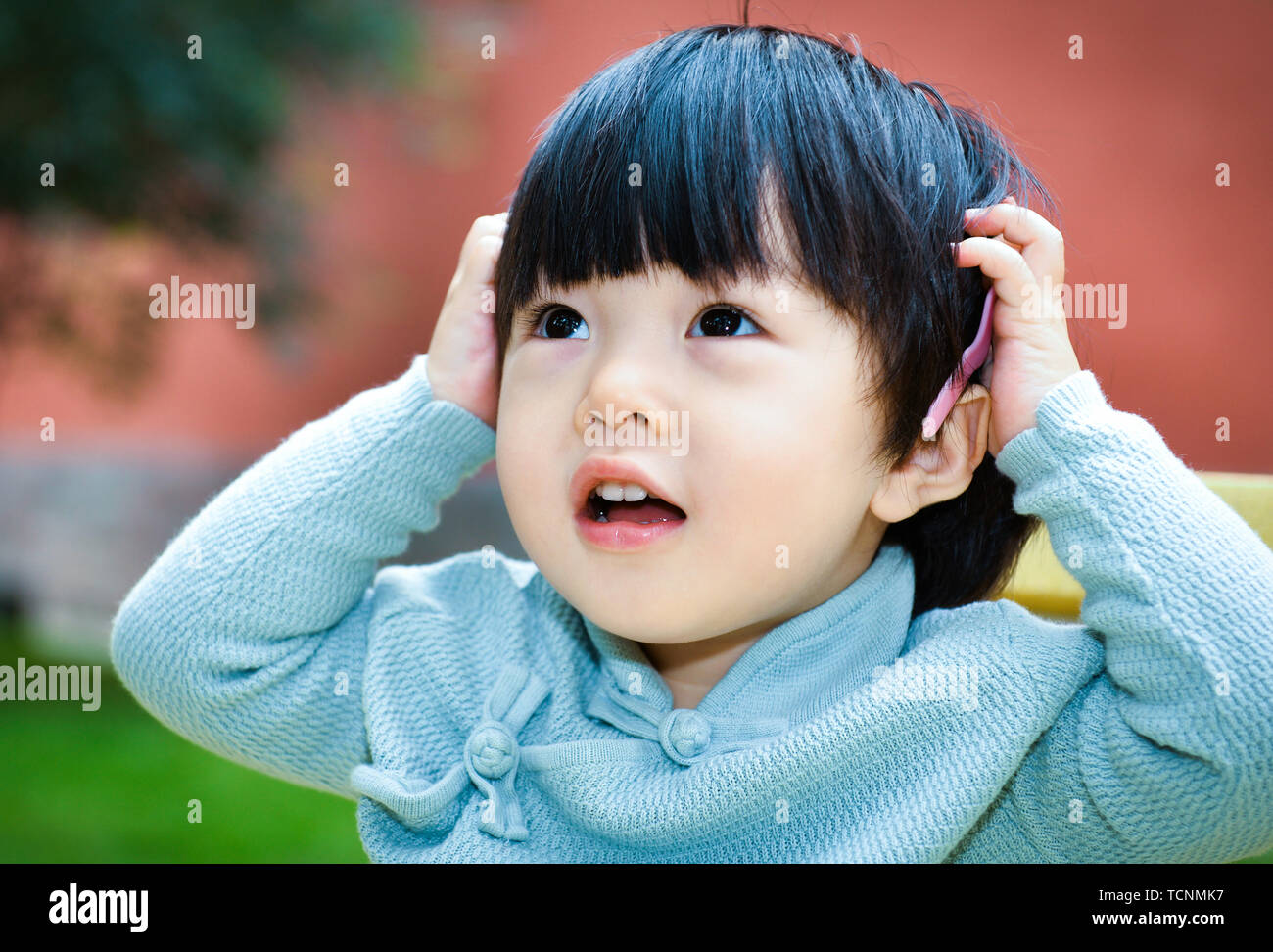 Children outdoor hand raised hi-res stock photography and images - Alamy