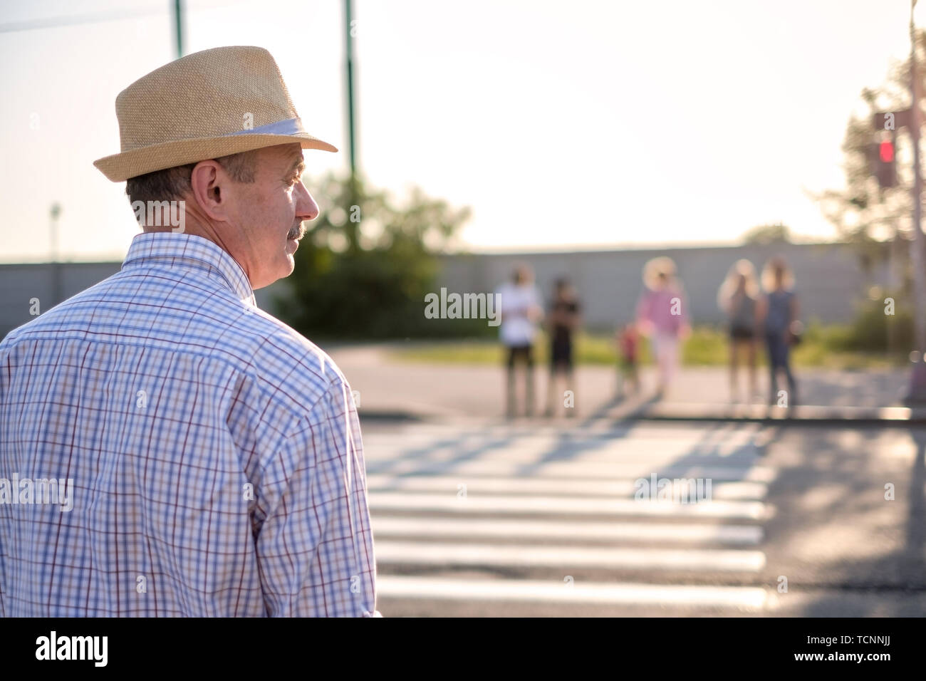 Old man at traffic stop hi-res stock photography and images - Alamy