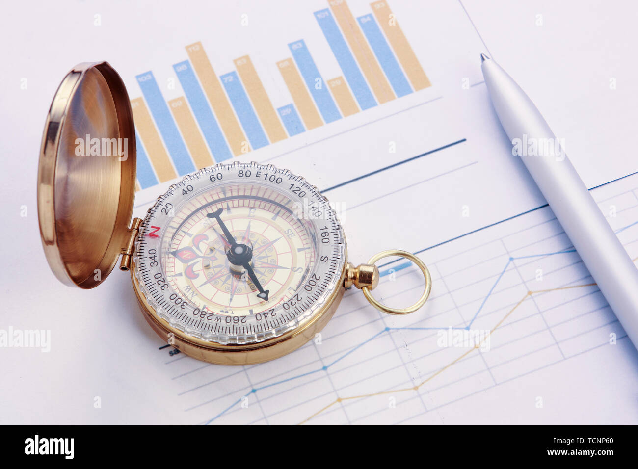 Data and compass Stock Photo - Alamy