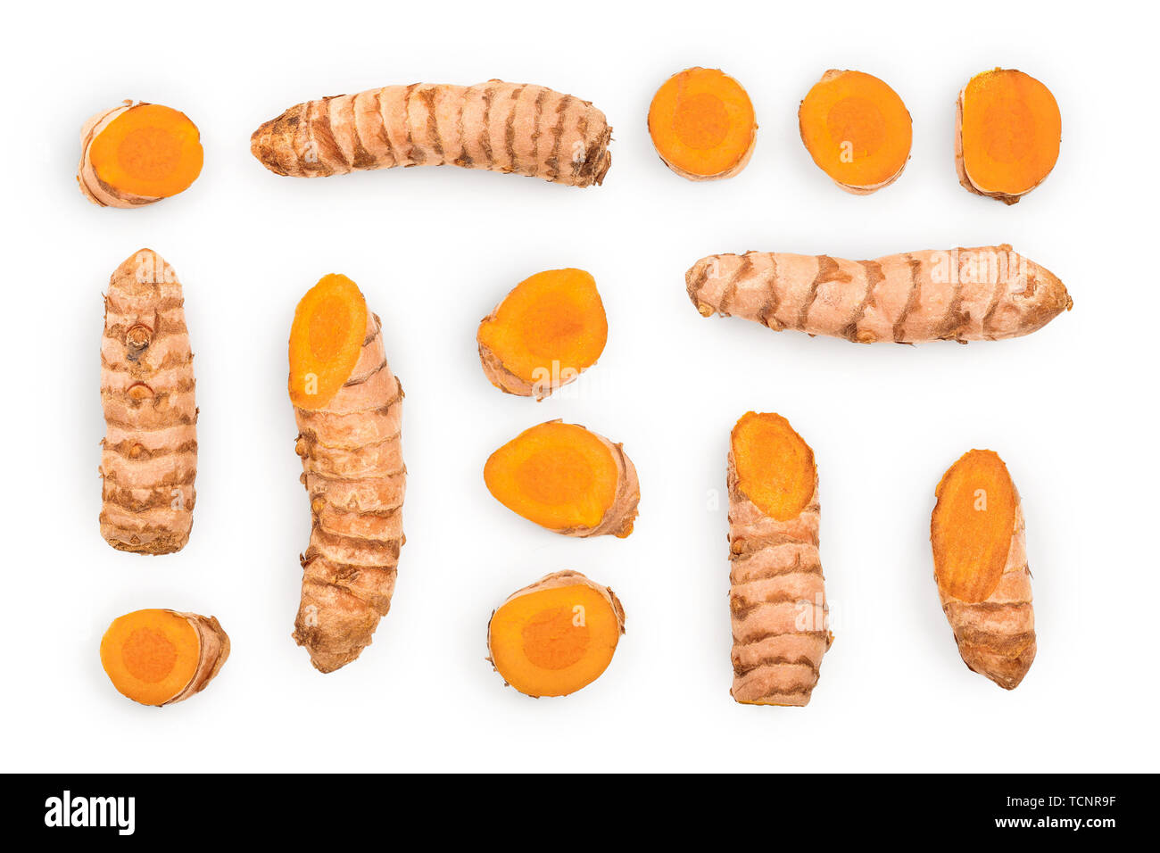 turmeric root and slices isolated on white background. Top view. Flat ...