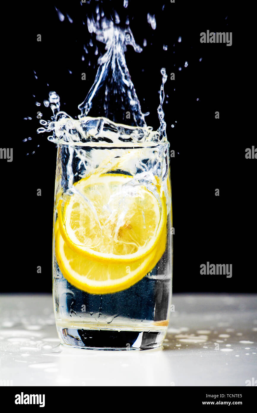 Splash clear lemonade Stock Photo - Alamy