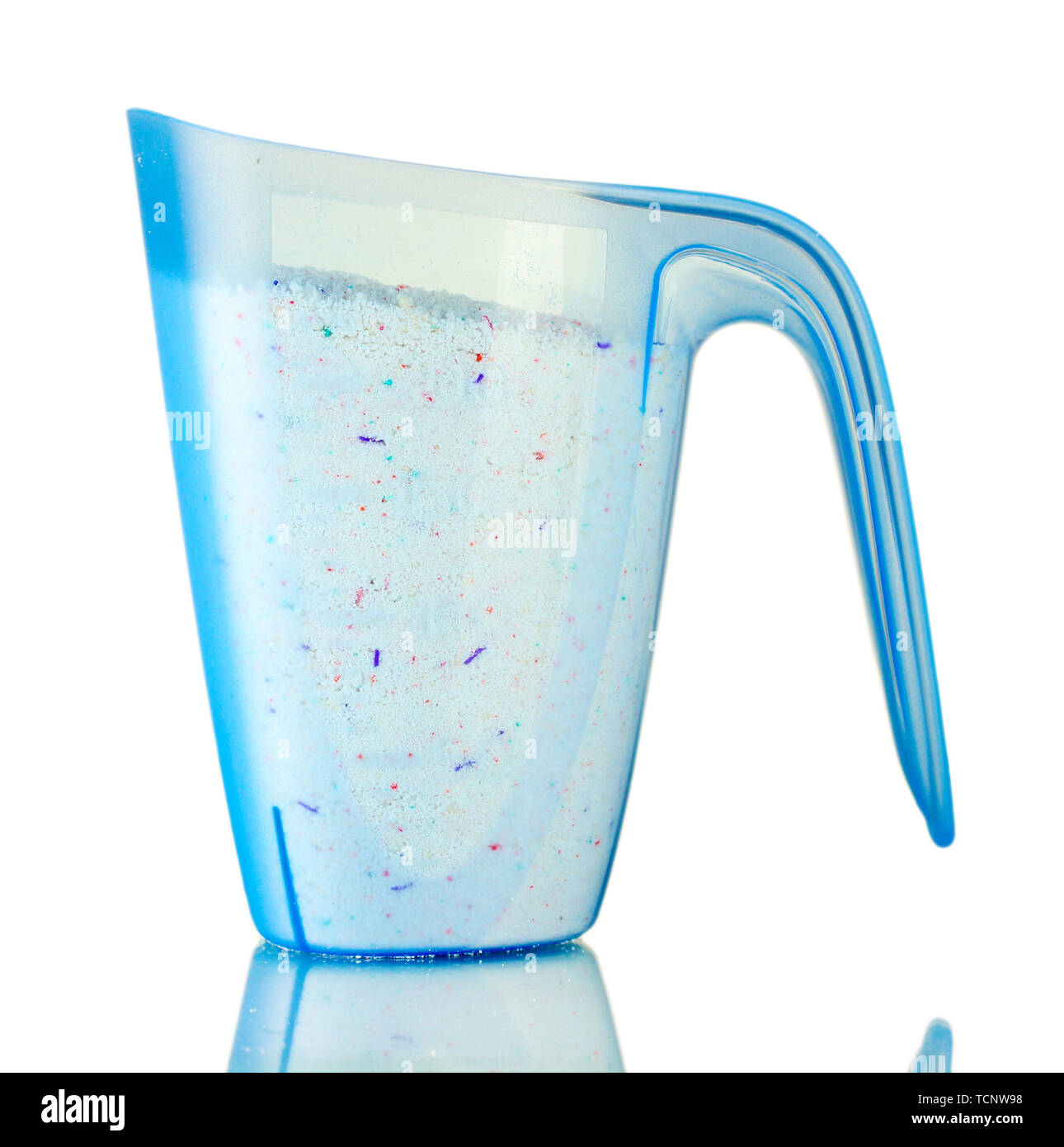 washing powder in a measuring cup, isolated on white Stock Photo - Alamy