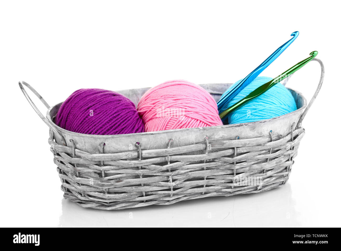 Bright threads for knitting in basket isolated on white Stock Photo - Alamy