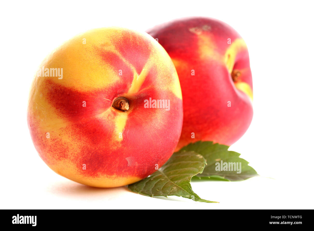 ripe nectarines, isolated on white Stock Photo - Alamy