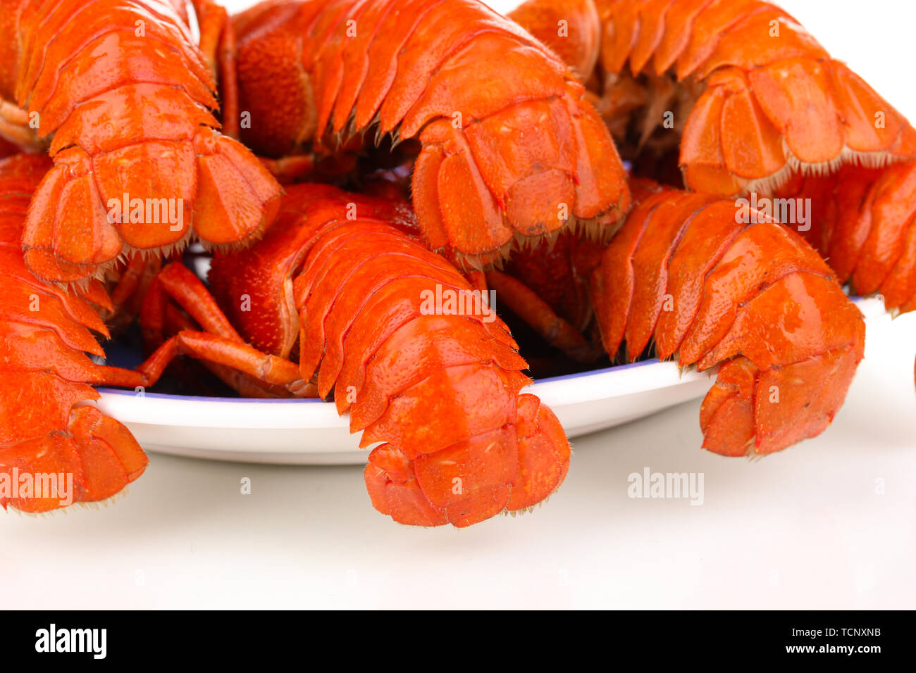 tasty crayfishes on plate isolated on white Stock Photo - Alamy