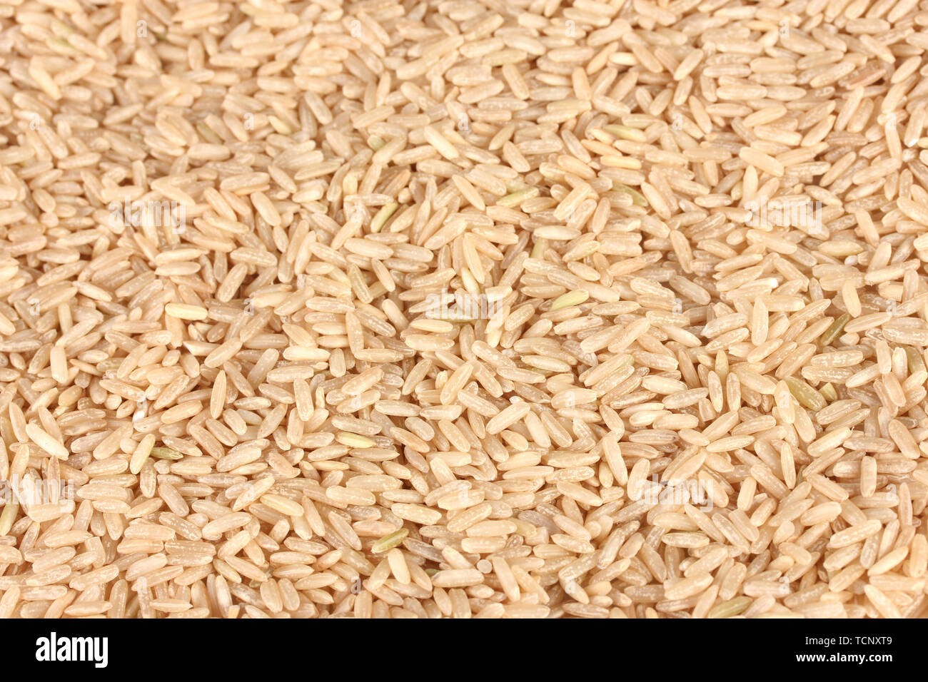 Background brown rice Stock Photo - Alamy