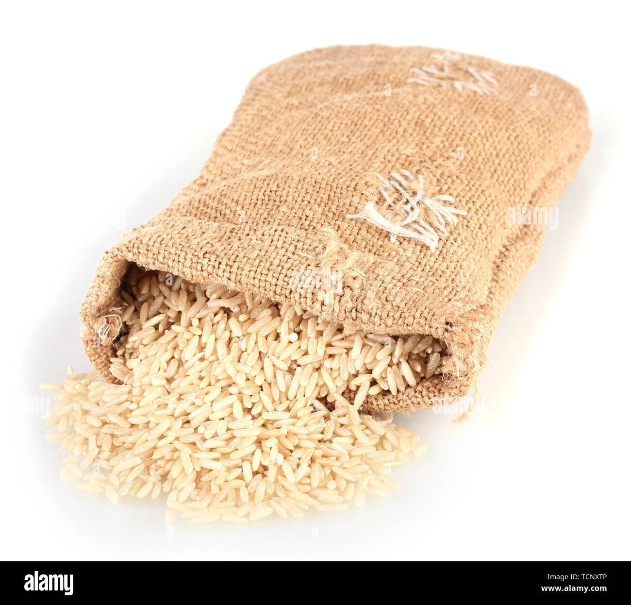 Cloth bag of rice isolated on white Stock Photo - Alamy