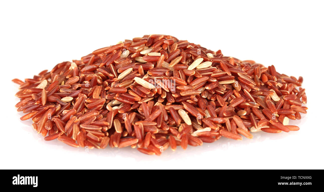 red rice uncooked in a heap isolated on a white background Stock Photo ...