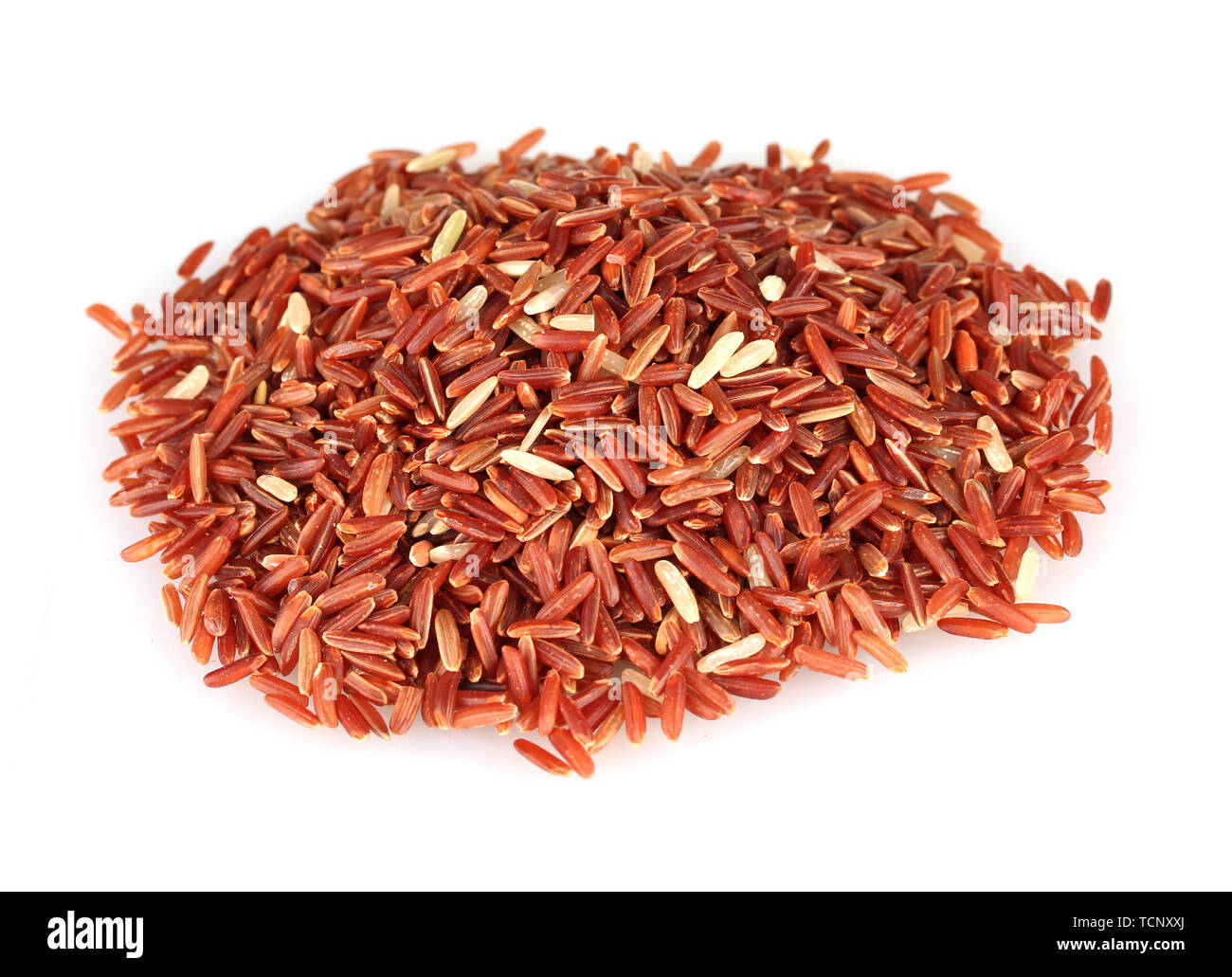 red rice uncooked in a heap isolated on a white background Stock Photo ...