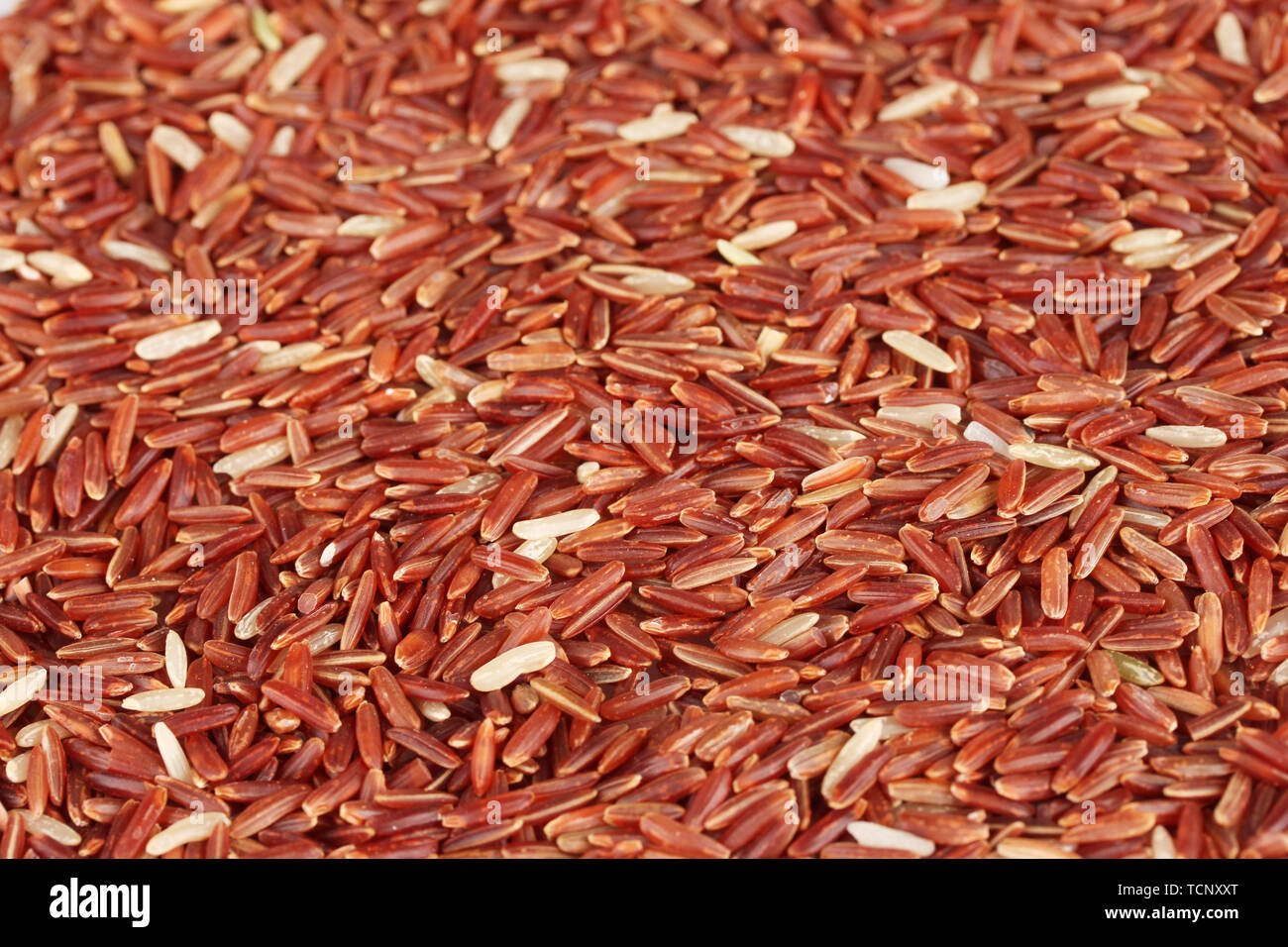 Background red rice Stock Photo - Alamy