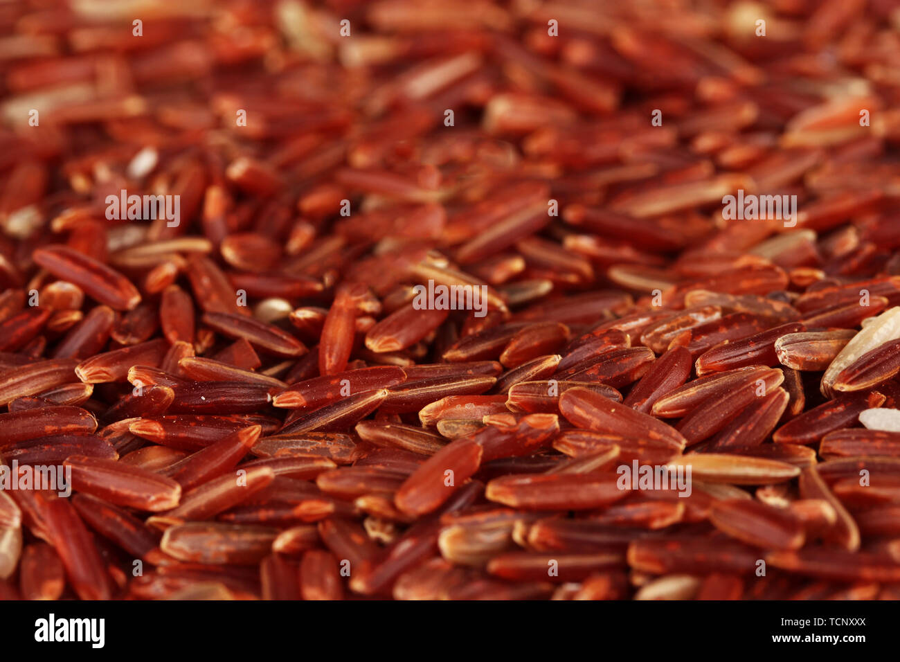 Background red rice Stock Photo - Alamy