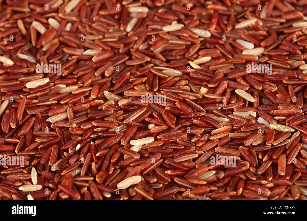 Background red rice Stock Photo - Alamy