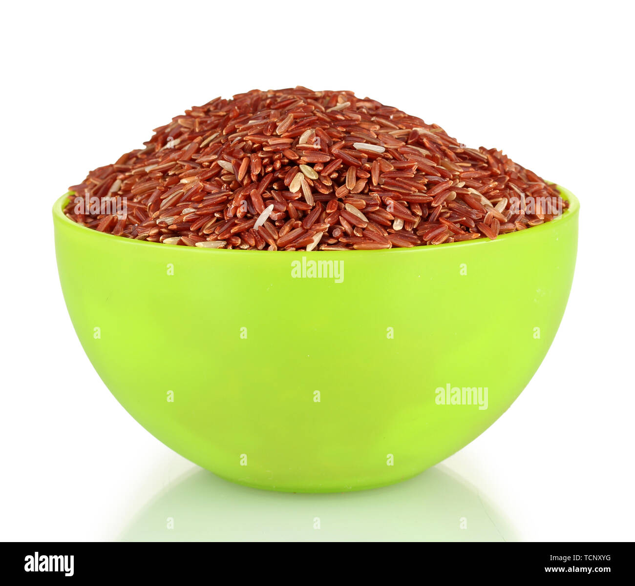 red rice in a green plate , isolated on white Stock Photo - Alamy