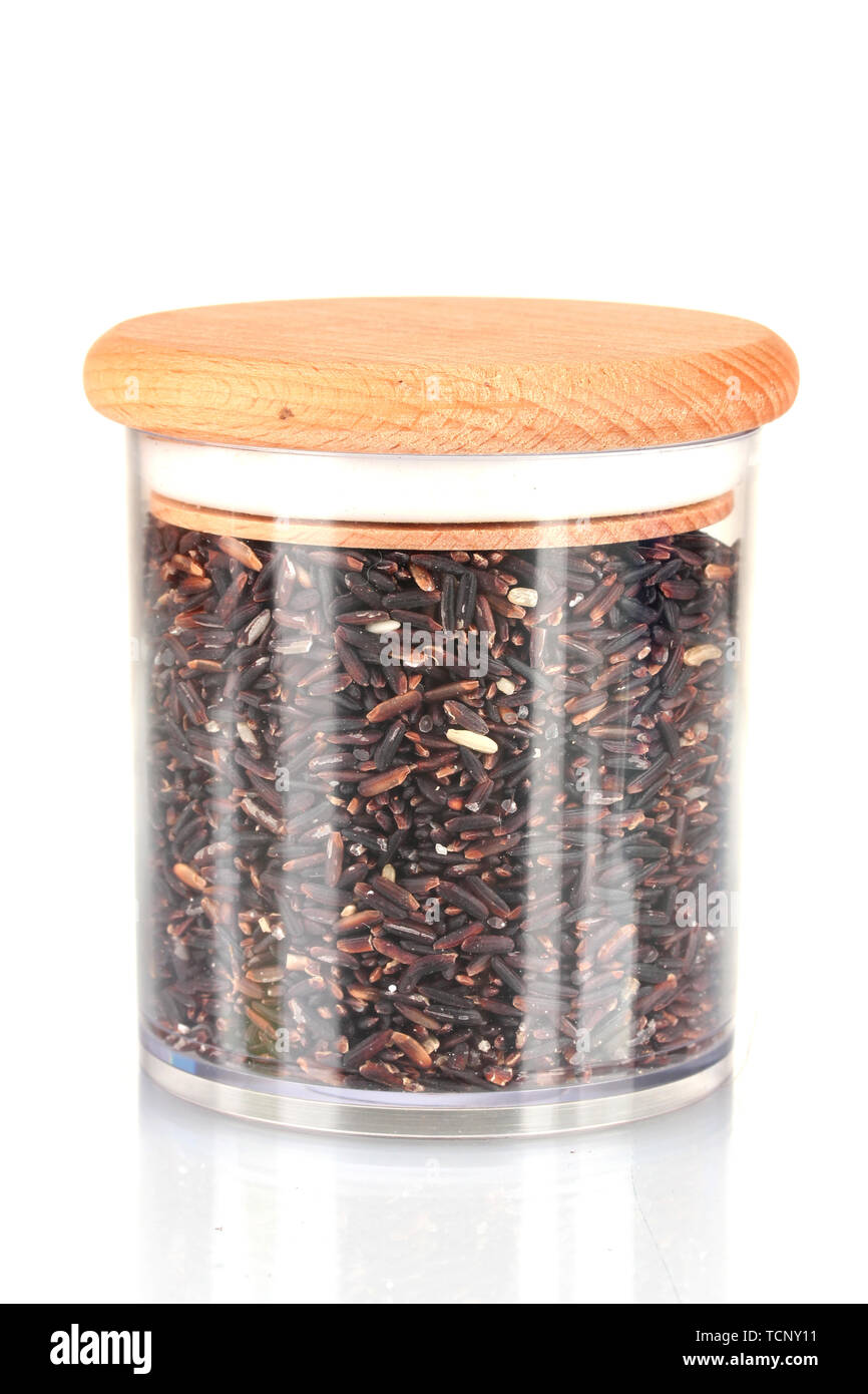 black rice in jar on white background Stock Photo - Alamy