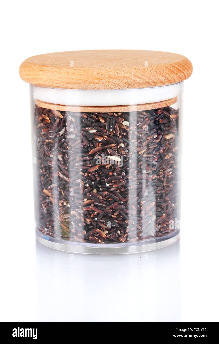 black rice in jar on white background Stock Photo - Alamy