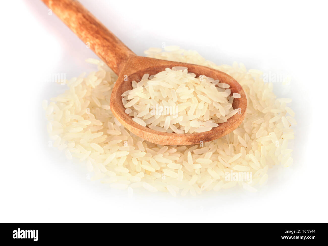 rice in wooden spoon isolated on white background Stock Photo - Alamy