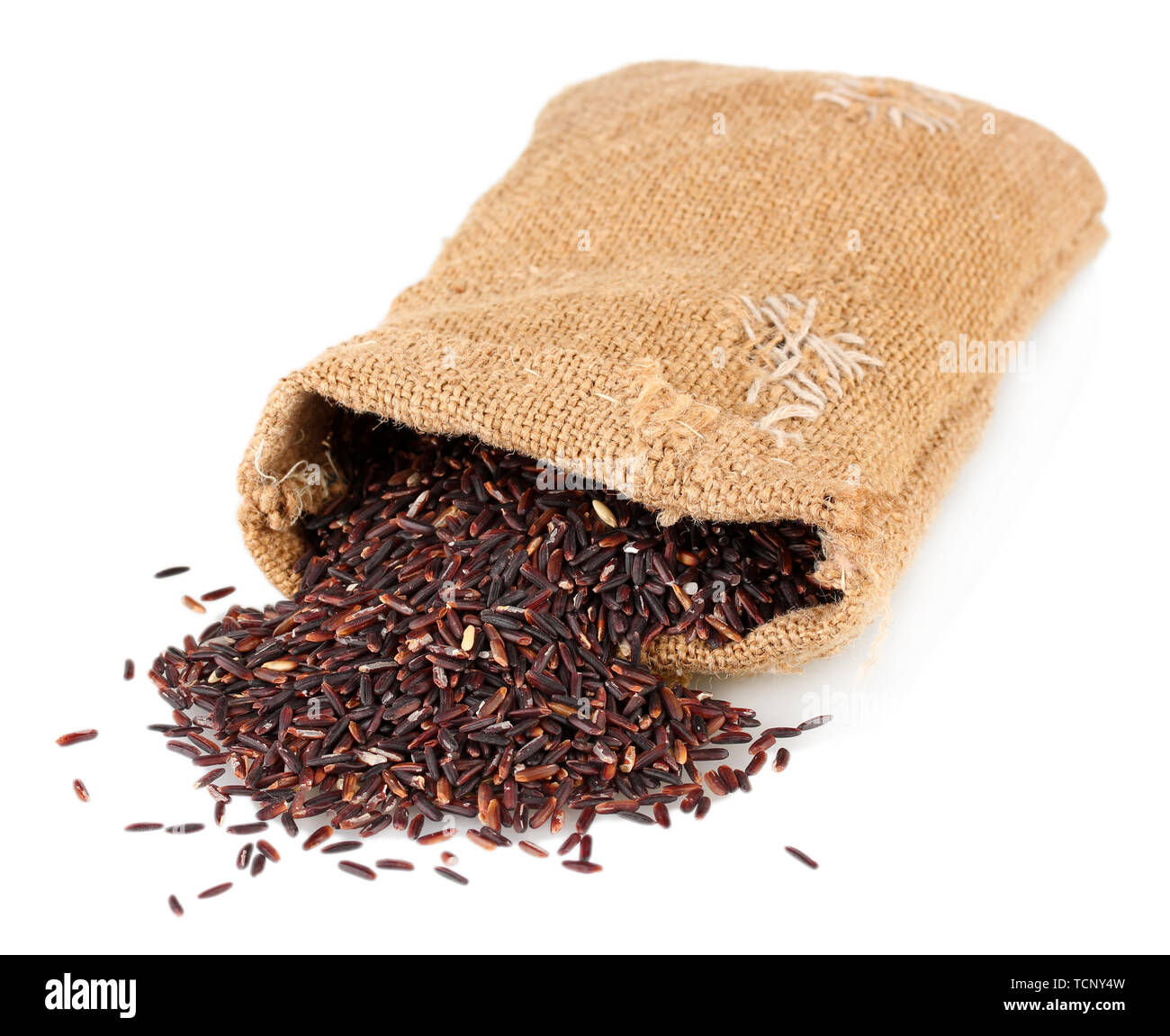 Cloth bag of black rice isolated on white Stock Photo - Alamy