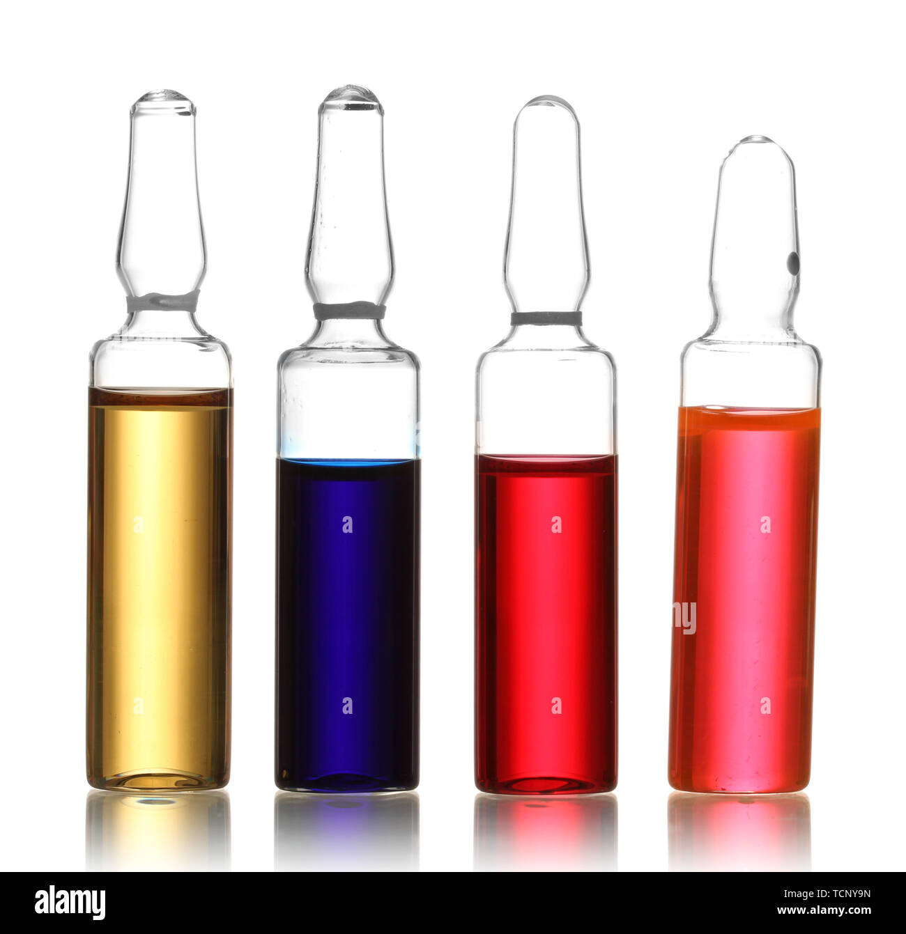 medical ampules with bright liquid, isolated on white Stock Photo - Alamy