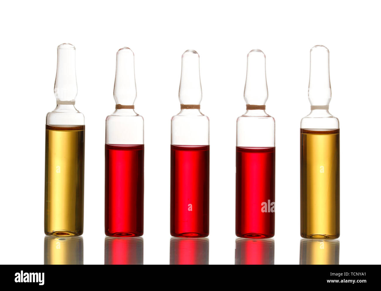medical ampules with bright liquid, isolated on white Stock Photo - Alamy