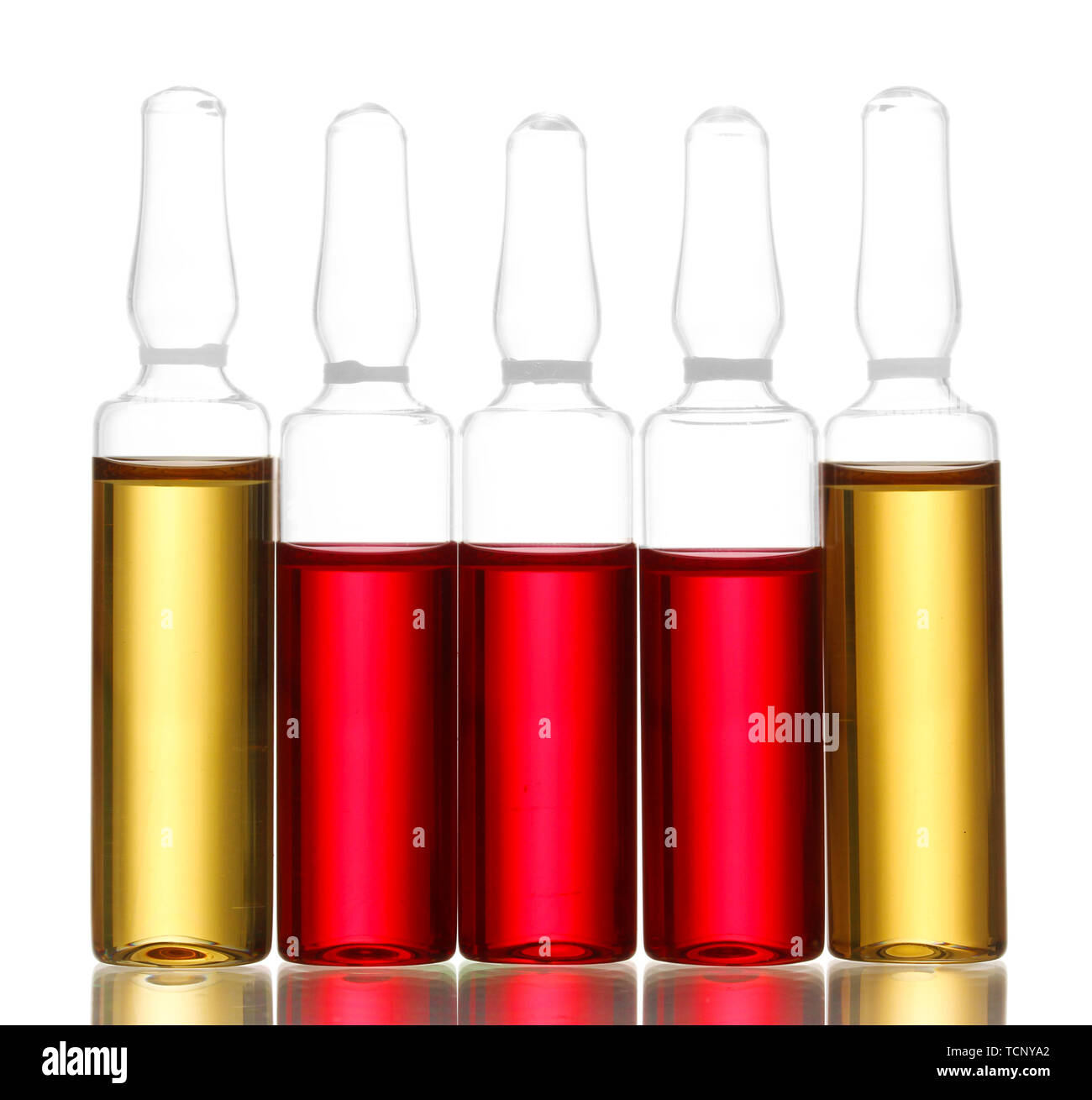 medical ampules with bright liquid, isolated on white Stock Photo - Alamy